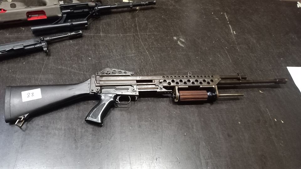 So they walk in with this special STONER M63 for sale, with a ...
