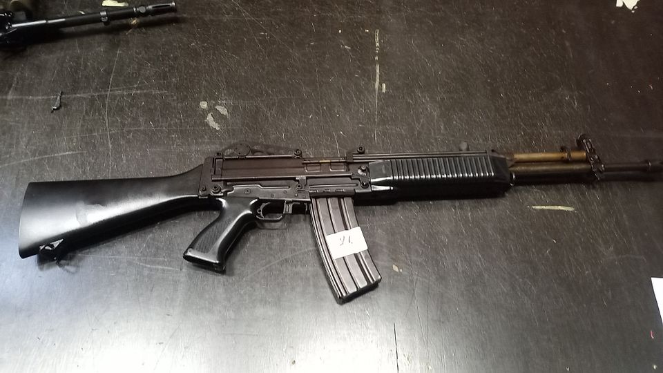 So they walk in with this special STONER M63 for sale, with a ...