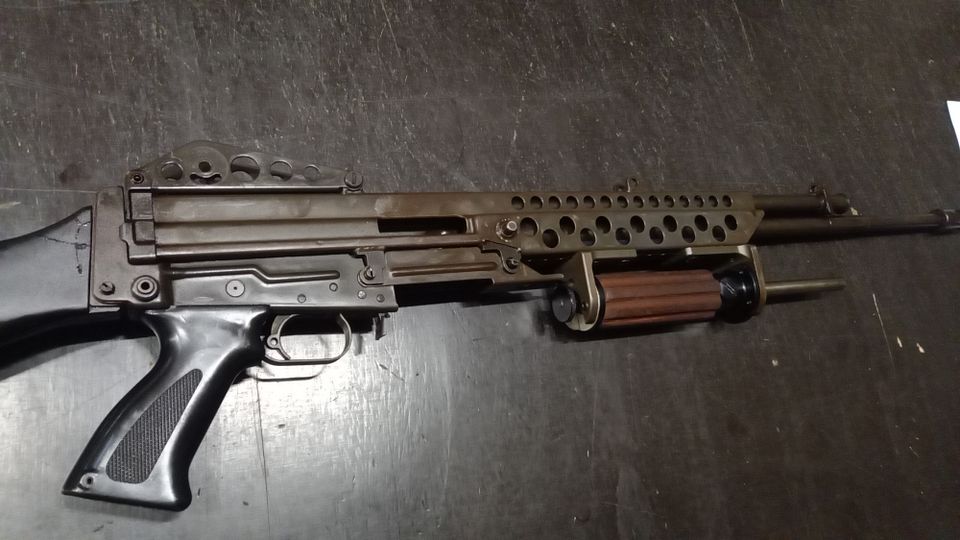 So they walk in with this special STONER M63 for sale, with a ...