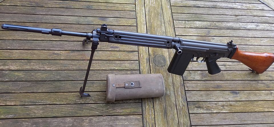 Achtung!! 2 super nice German FN G1's with BGS scope and ERMA 22LR kit ...