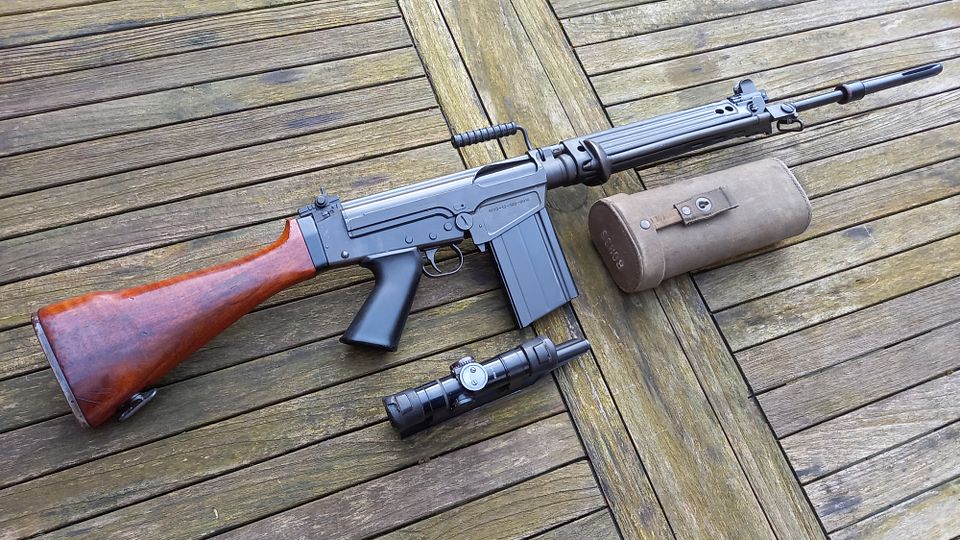 Achtung!! 2 super nice German FN G1's with BGS scope and ERMA 22LR kit ...