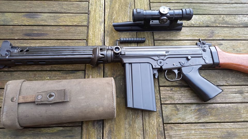 Achtung!! 2 super nice German FN G1's with BGS scope and ERMA 22LR kit ...