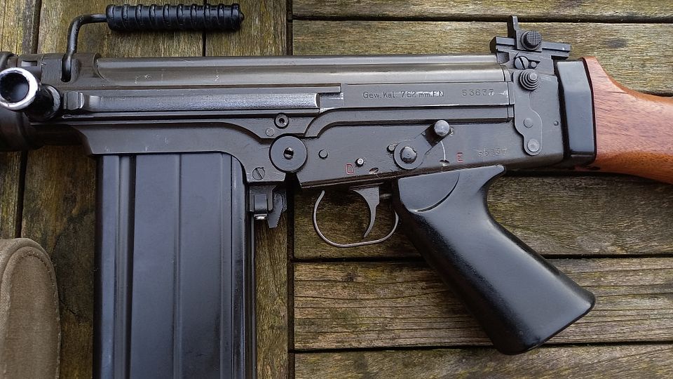 Achtung!! 2 super nice German FN G1's with BGS scope and ERMA 22LR kit ...