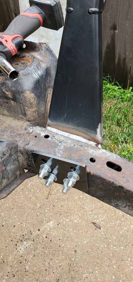 Drilling holes perfectly straight through both frame rails ...