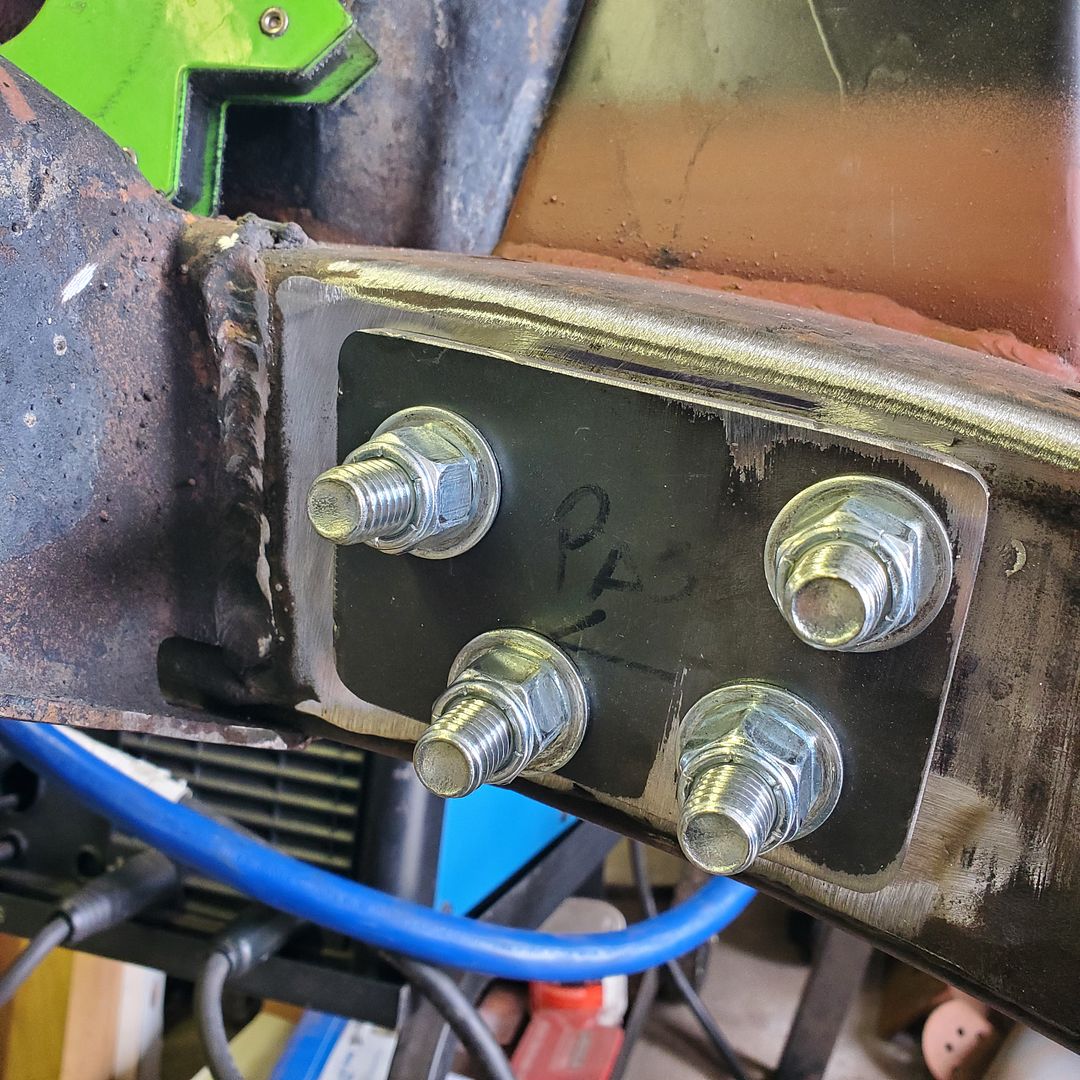Drilling holes perfectly straight through both frame rails ...