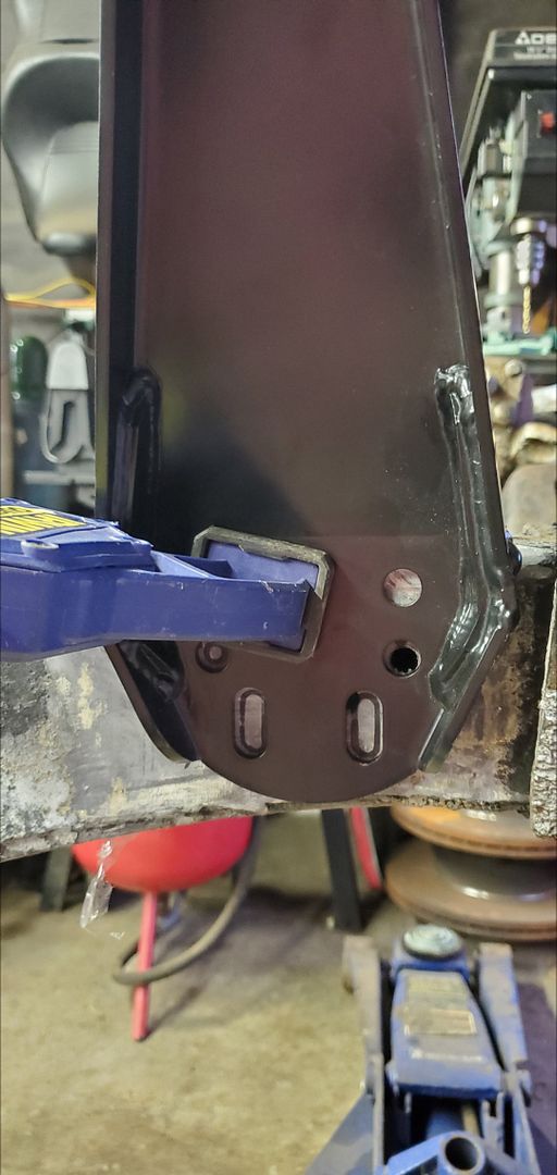 Drilling holes perfectly straight through both frame rails ...