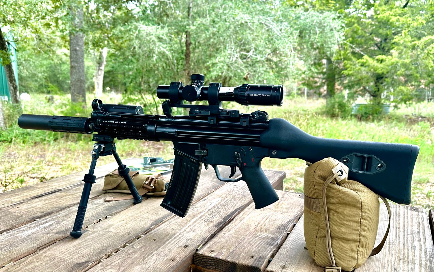 Has anyone tried a Vector V53 SBR with an AAC Titan QD 338 Suppressor ...