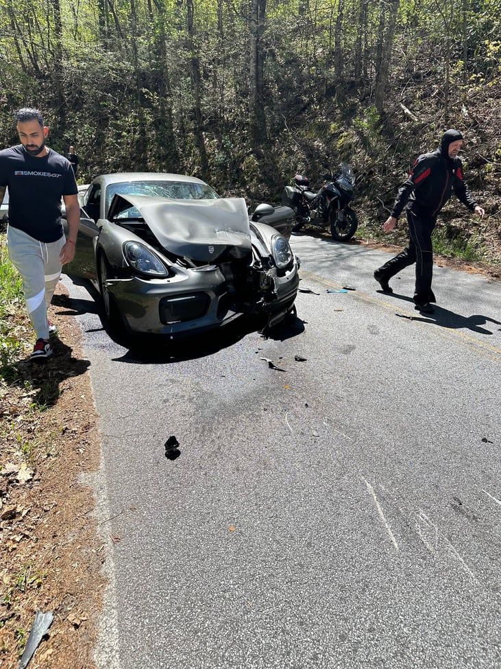 GT4 gets totaled from Motorcycle crossing the line near Tail of Dragon ...